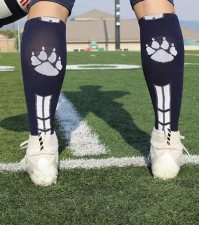 The Benefits of Team Sports & Custom Sports Socks | MadSportsStuff